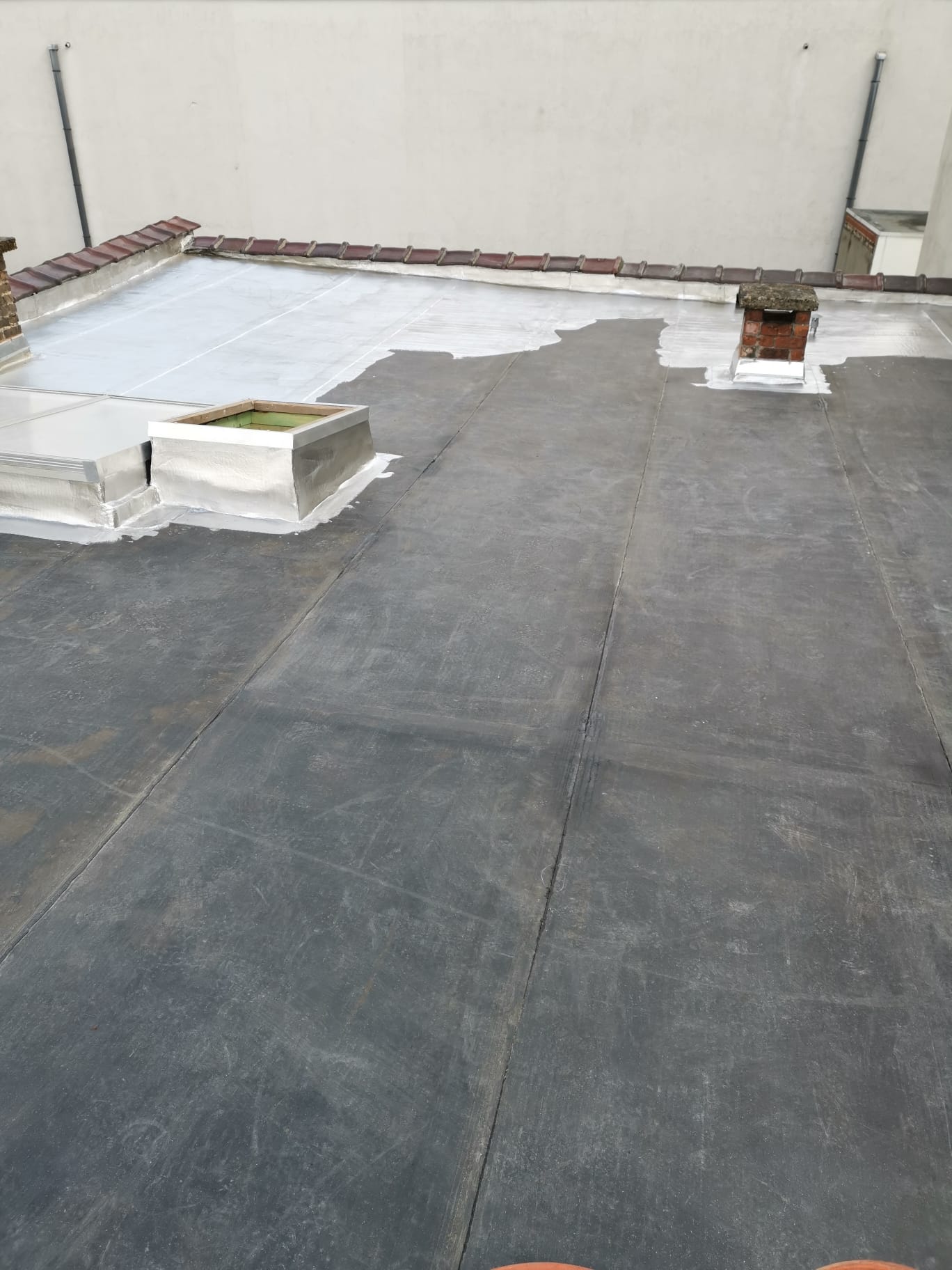 Rénovation et isolation d'un toit plat - Toitures Rada